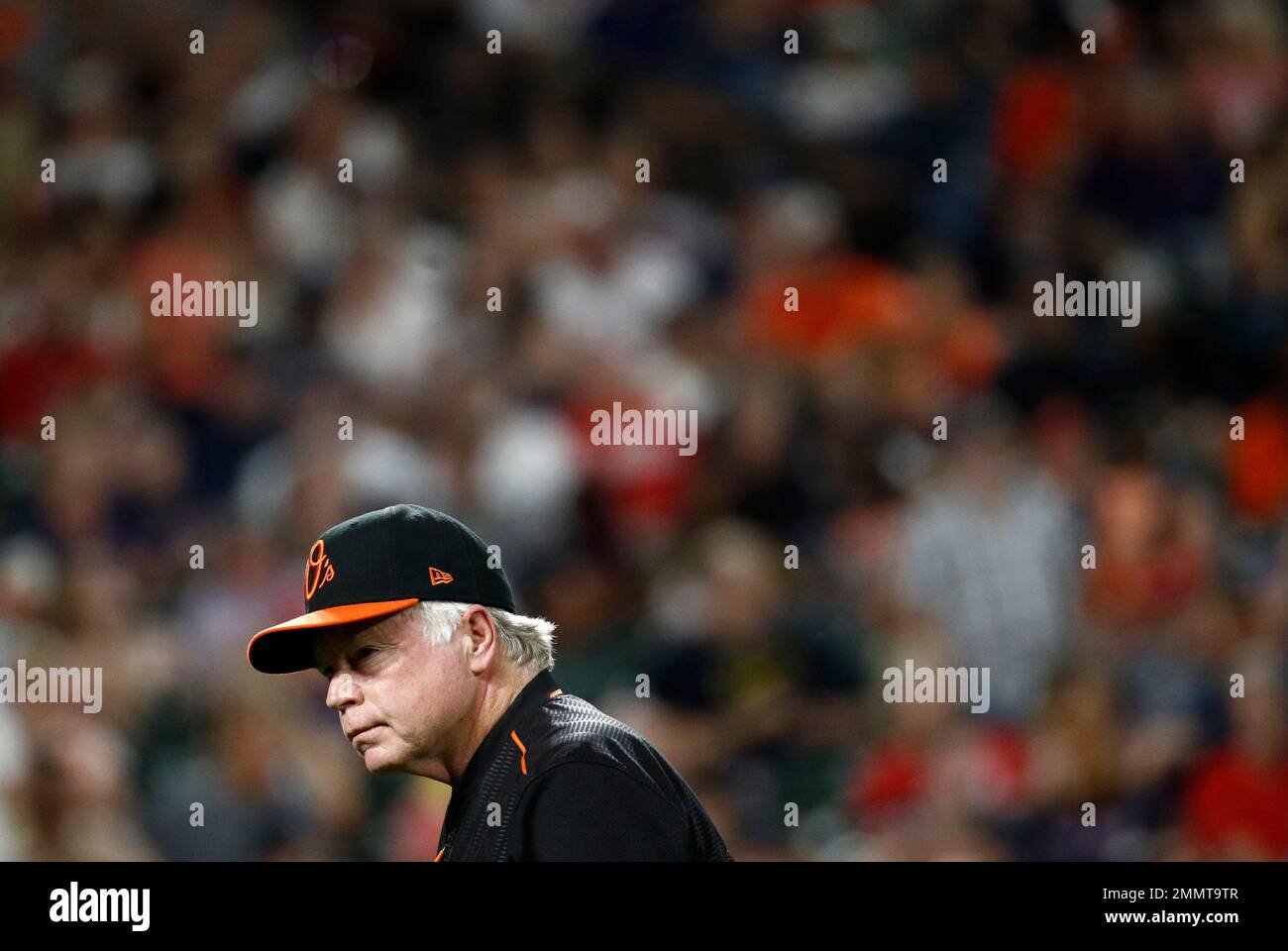 Baltimore Orioles manager Buck Showalter walks off the field after ...