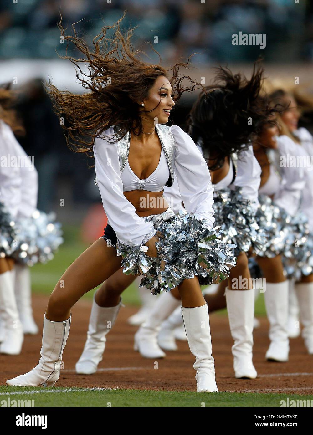 Oakland Raiders cheerleaders perform before an NFL preseason football ...