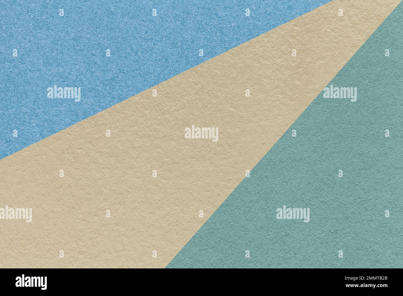 Texture of old craft beige, blue and turquoise color paper background ...