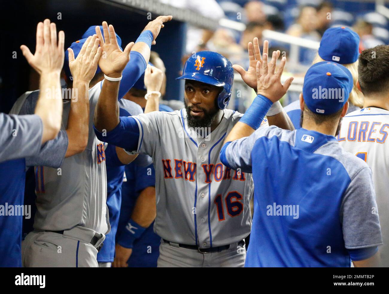 New York Mets' Austin Jackson (16) is congratulated by teammates after ...