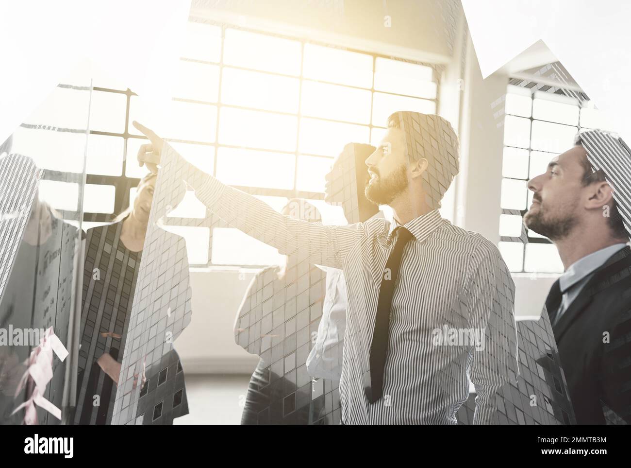 Powered by the same corporate vision. Multiple exposure shot of ...