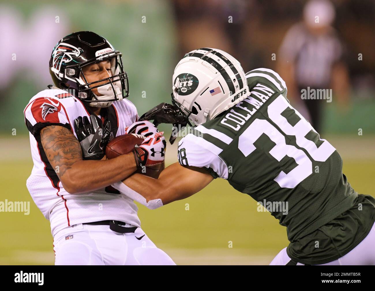 Atlanta Falcons wide receiver Devin Gray, left, fights for the ball ...