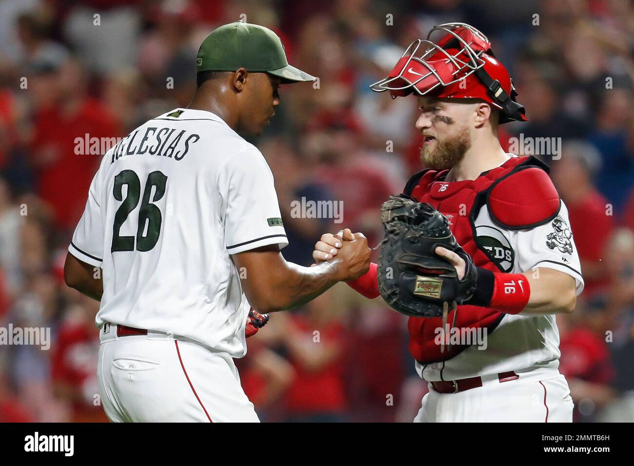 Cincinnati Reds relief pitcher Raisel Iglesias (26) celebrate with ...
