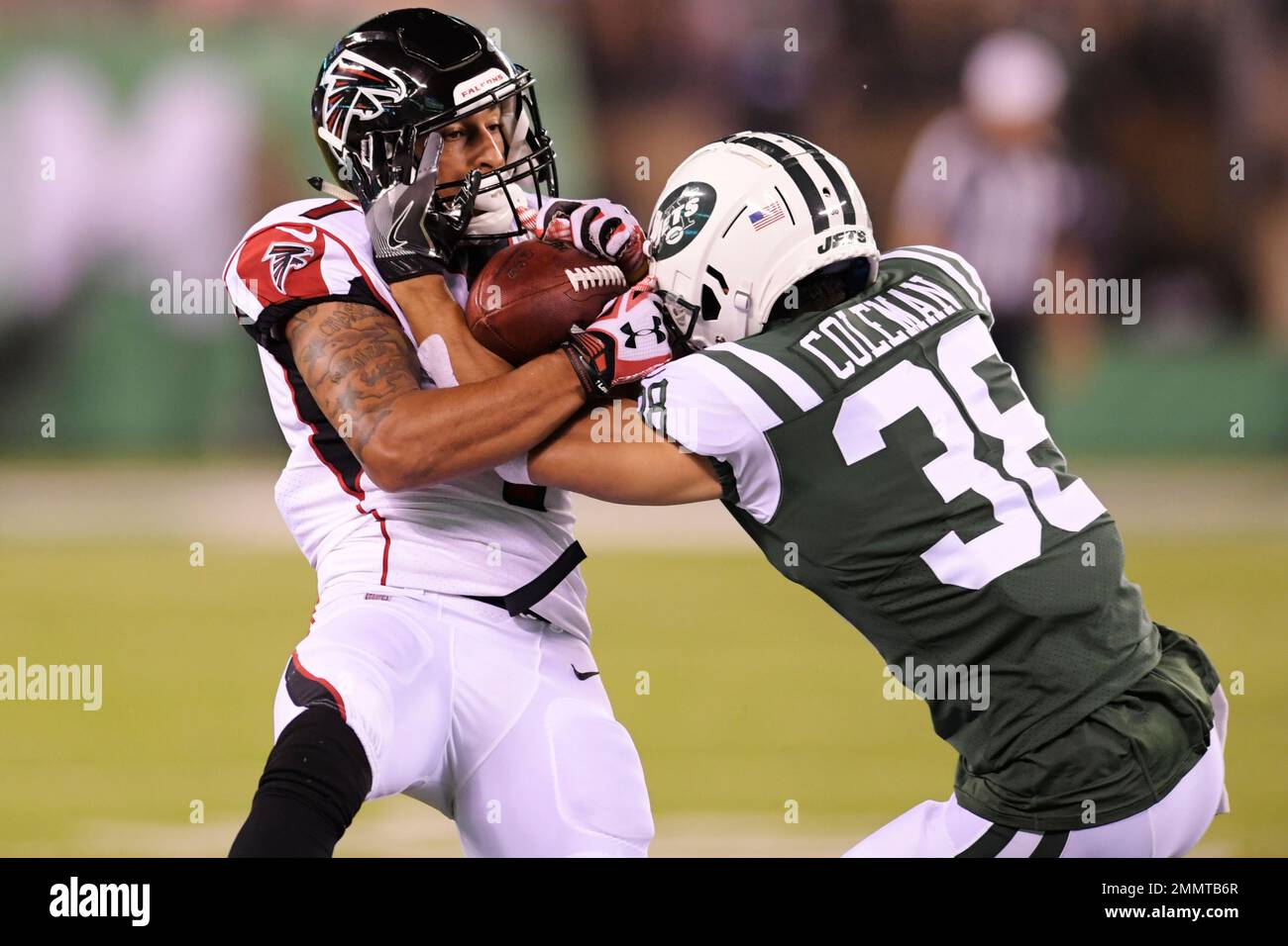 Atlanta Falcons wide receiver Devin Gray, left, fights for the ball ...