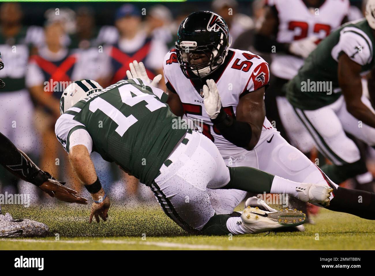 Atlanta Falcons linebacker Foye Oluokun (54) hits New York Jets' Sam ...