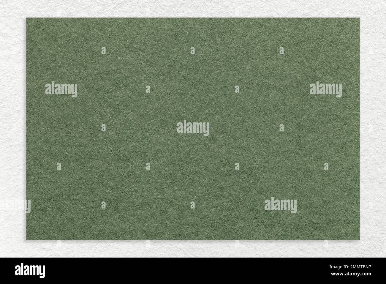 Texture of craft green color paper background with white border, macro ...