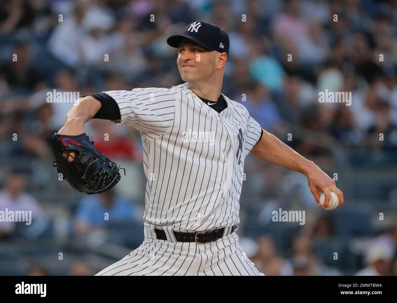 New York Yankees starting pitcher J.A. Happ delivers against the Texas ...