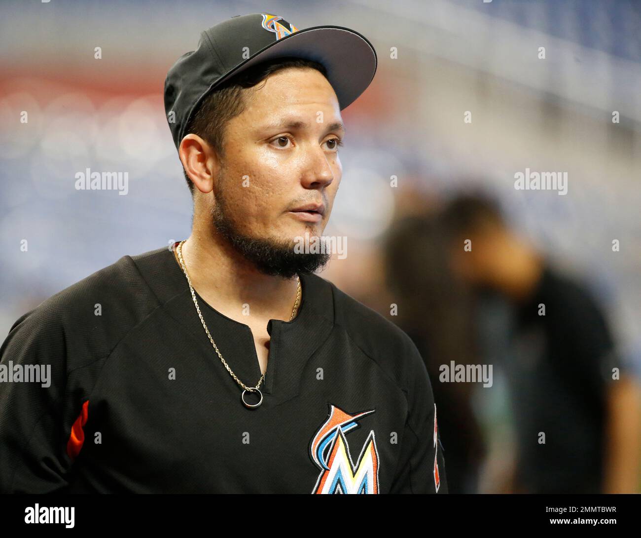 Miami Marlins' Miguel Rojas waits for his turn at batting practice ...