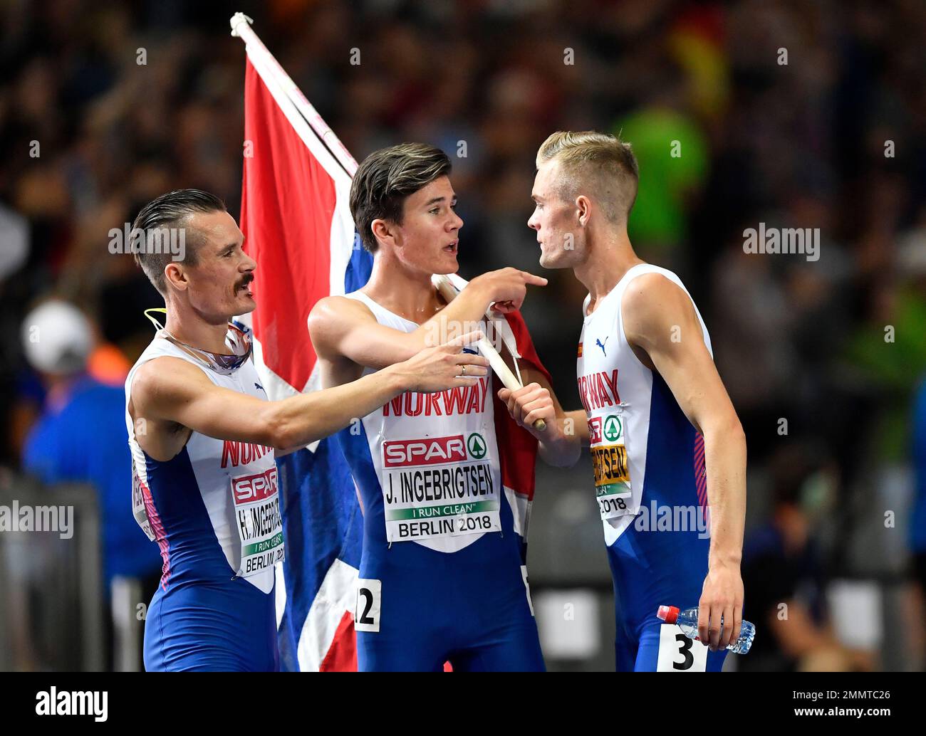 Norway's gold medal winner Jakob Ingebrigtsen is flanked by his brothers Henrik Ingebrigtsen ...