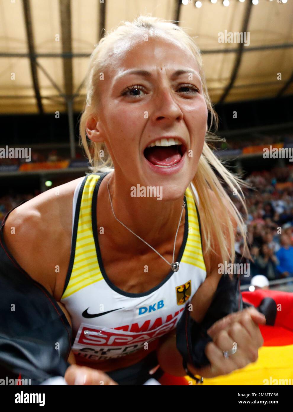 Germany's Kristin Gierisch celebrates after winning the silver medal in ...