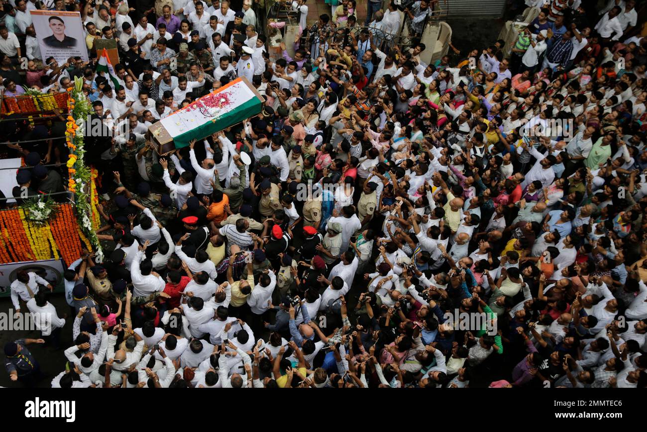 In this Thursday, Aug 9, 2018, file photo, people carry the coffin of ...