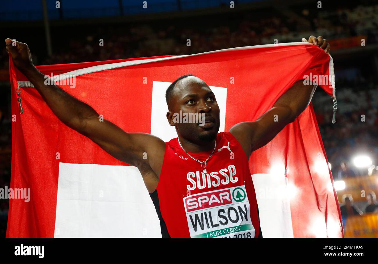 Switzerland's Alex Wilson celebrates after winning the bronze medal in ...