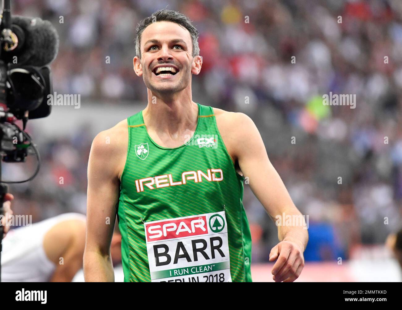 Ireland's Thomas Barr smiles after winning the bronze medal in the men ...