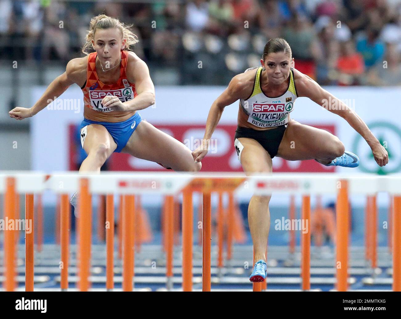 Netherlands' Nadine Visser, left, and Germany's Pamela Dutkiewicz ...