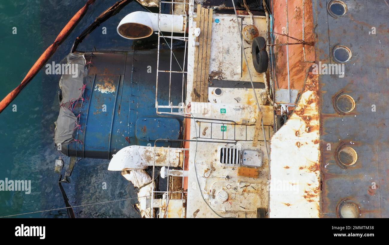 Fragment of an old sunken ship. Oil tanker after the accident. Global ...