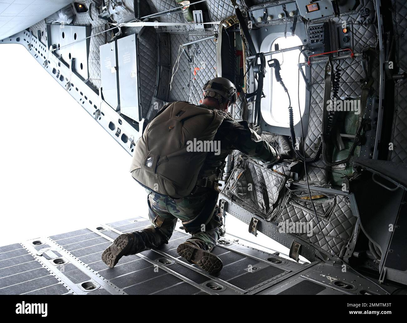 A Jumpmaster from the U.S. Army John F. Kennedy Special Warfare Center ...