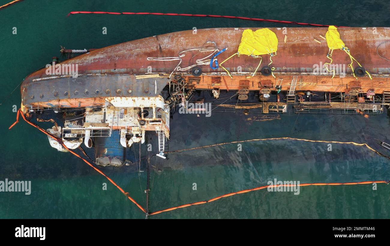 Fragment of the ship after the crash. Oil pollution of the sea. Global ...