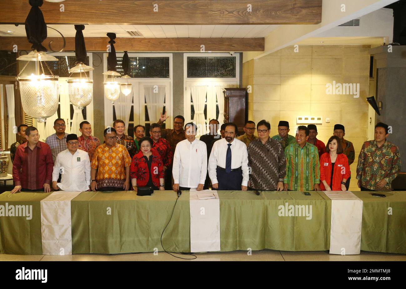 Indonesian President Joko Widodo, front row, fifth from left, pose for ...