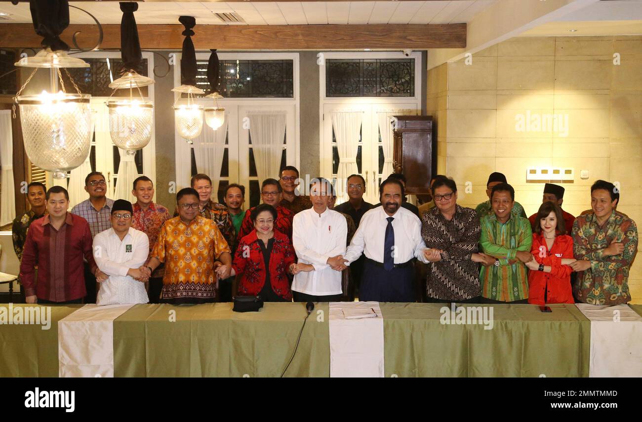 Indonesian President Joko Widodo, fifth left in front, poses for ...
