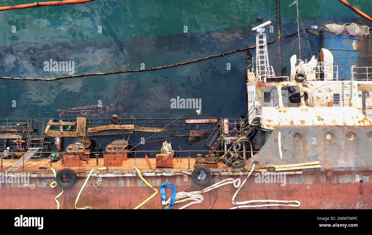 Pollution of the World Ocean. Top view of the deck of the sunken ship ...