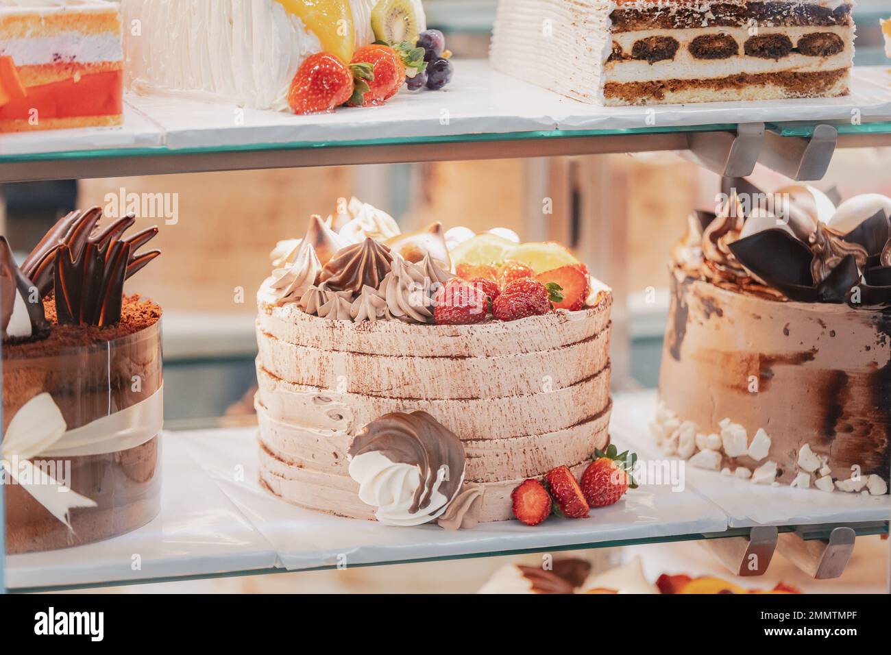 cake with strawberries, yummy assortment baked pastry in bakery ...