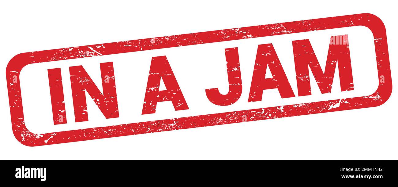 IN A JAM text written on red rectangle stamp sign Stock Photo - Alamy