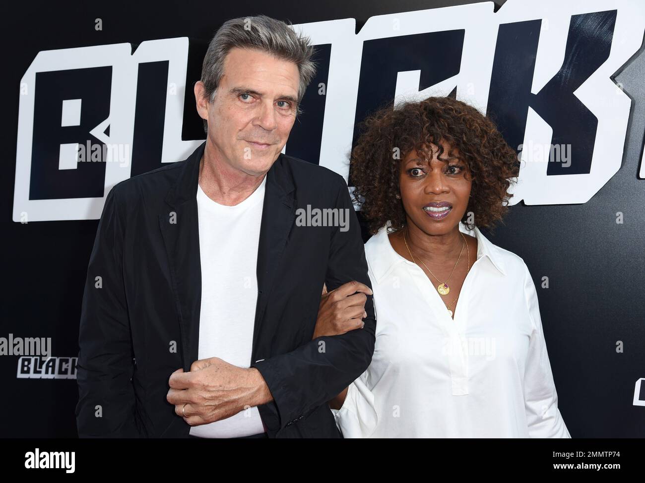 Roderick Spencer, left, and Alfre Woodard arrive at the premiere of ...