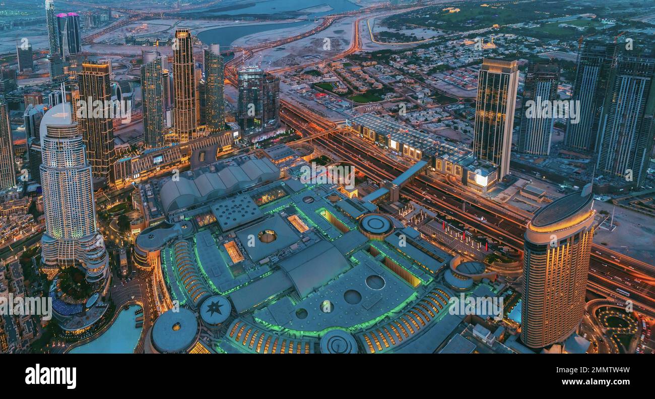 Aerial View Of Evening Night Scenic View Of Skyscraper. Night Traffic In Residential District in ...