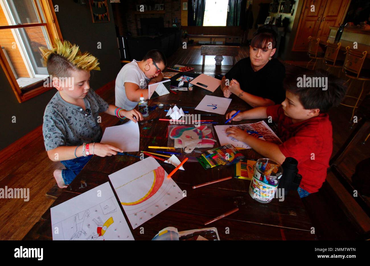 In this Aug. 1, 2018, photo, from left, Cash Miller, his sister Kaya ...