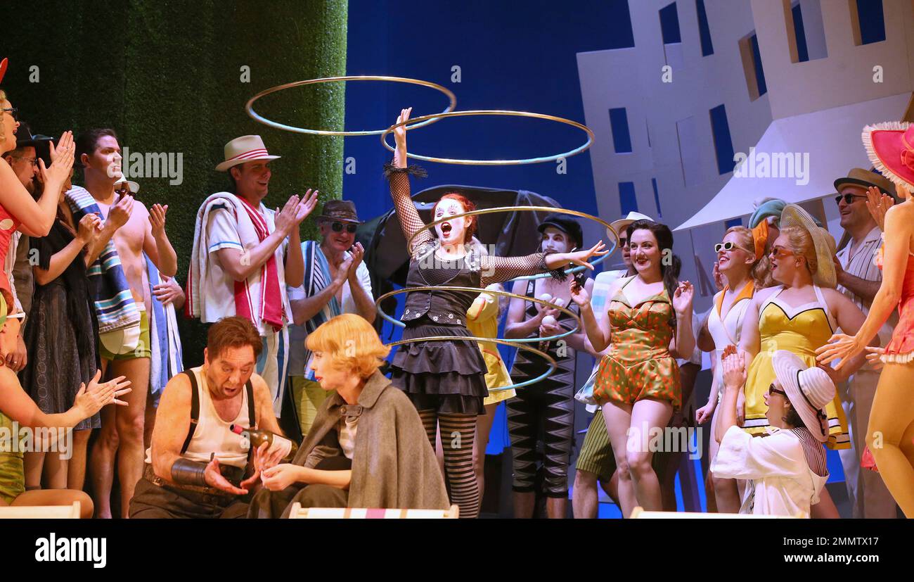 Performers from Opera Australia play a scene from the production "The ...