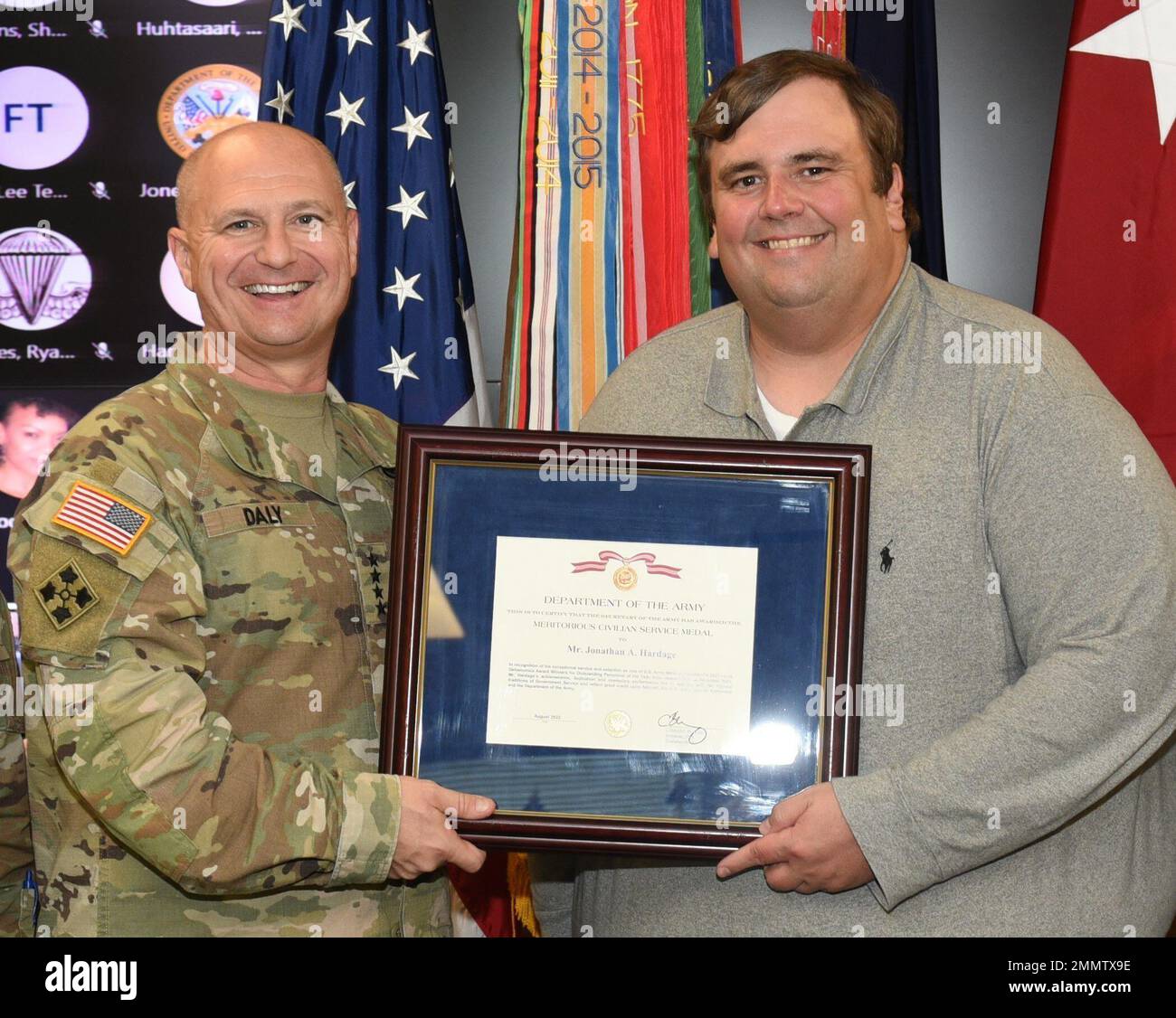 Gen. Ed Daly, Army Materiel Command commanding general, presents the ...