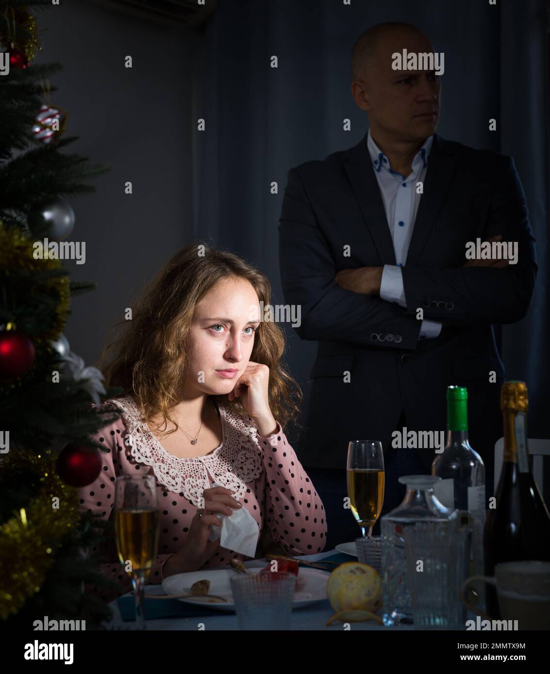 Quarrel of wife and husband at the Christmas table Stock Photo - Alamy