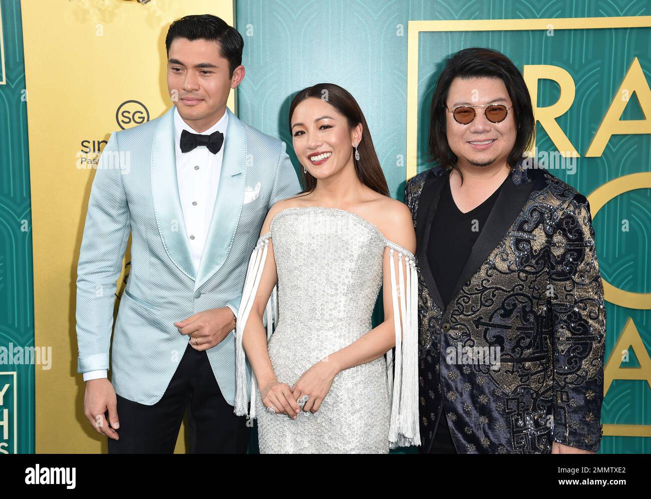 Henry Golding, from left, Constance Wu and executive producer/author ...