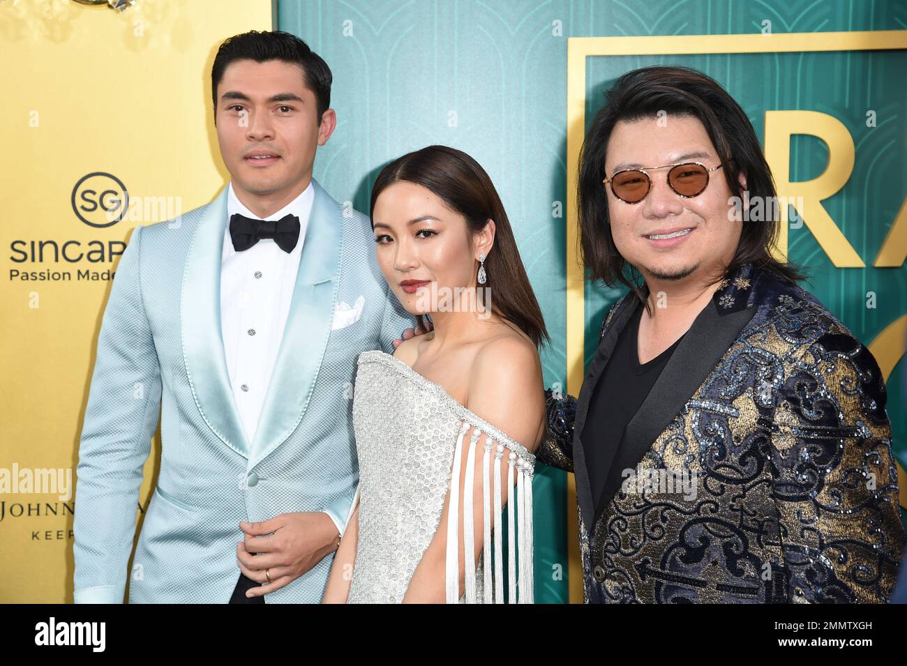 Henry Golding, from left, Constance Wu and executive producer/author ...