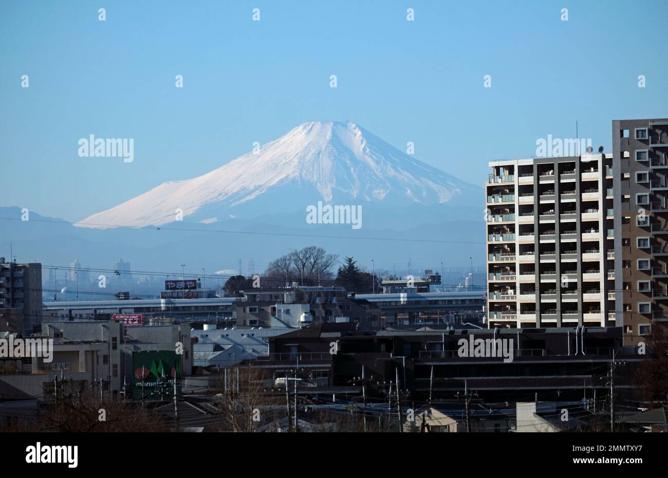 Mount Fuji seen from a distance outside of Tokyo, Japan Stock Photo - Alamy