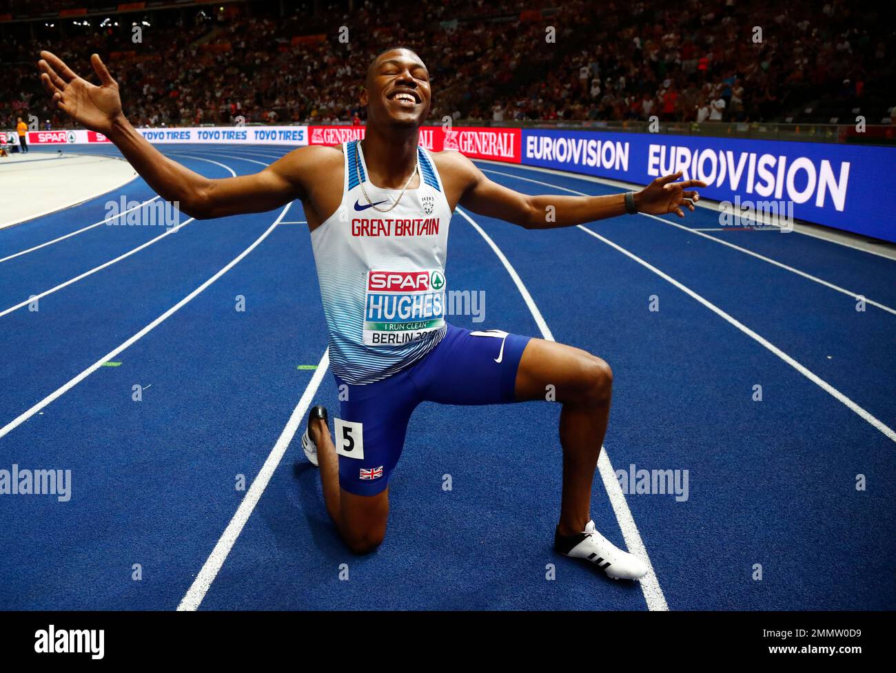 Britain's Zharnel Hughes celebrates after winning the gold medal in the ...