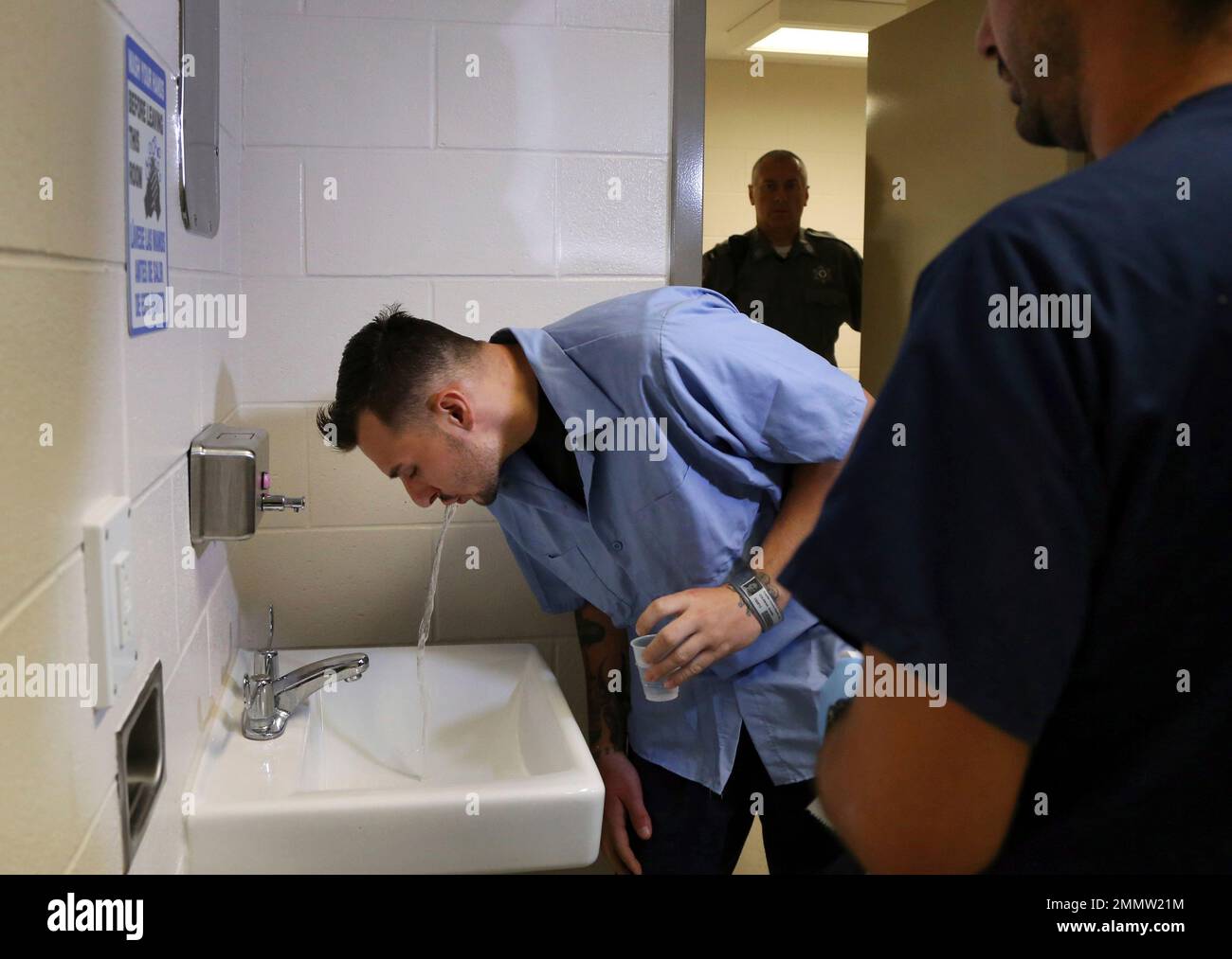 In this July 23, 2018 photo, inmate Shawn Coleman spits into a sink ...