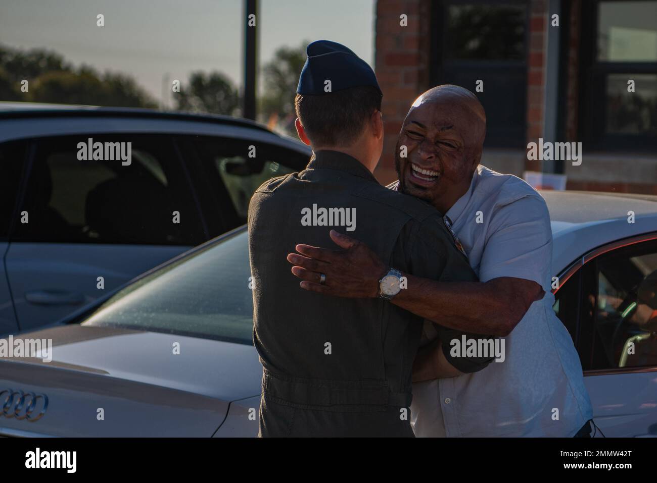 Col. Steven Wick, 317th Airlift Wing vice commander hugs J.R. Martinez ...