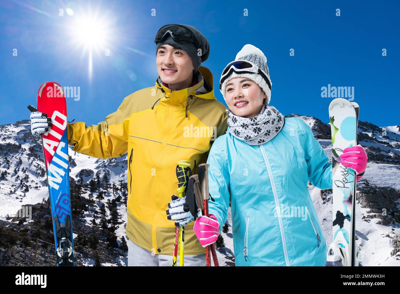 The young couple ski Stock Photo - Alamy