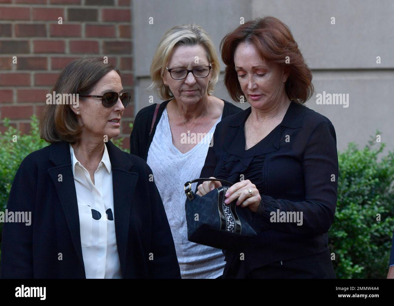 Kathleen Manafort, right, wife of Paul Manafort, leaves the Alexandria ...
