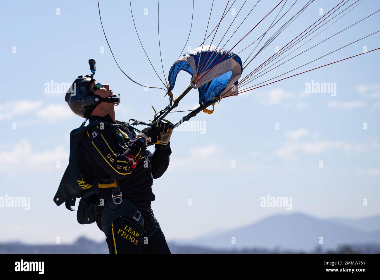 The U.S. Navy Parachute Team, nicknamed the Leap Frogs, conducts an ...