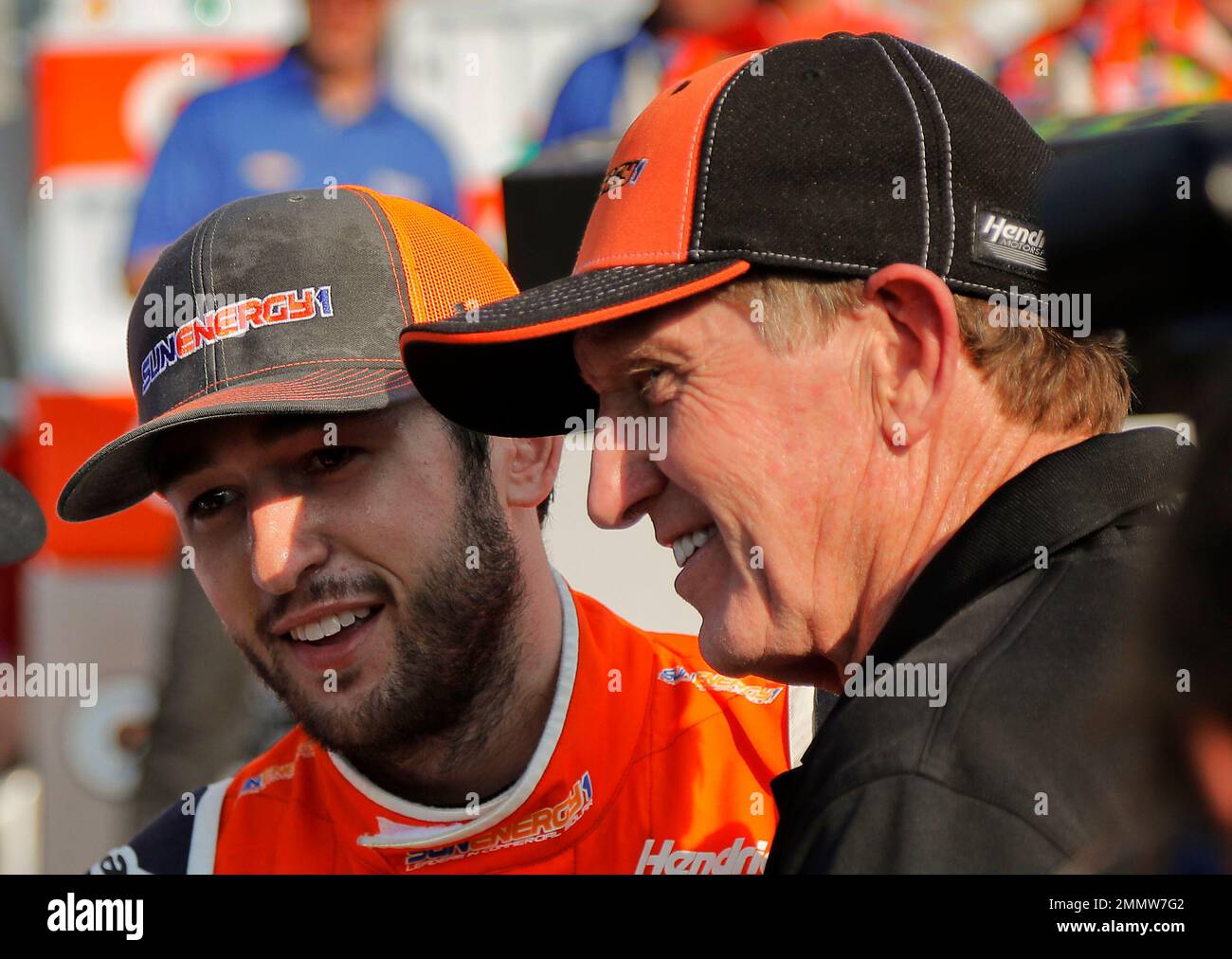 Chase Elliott, left, and his father Bill Elliott answer questions ...