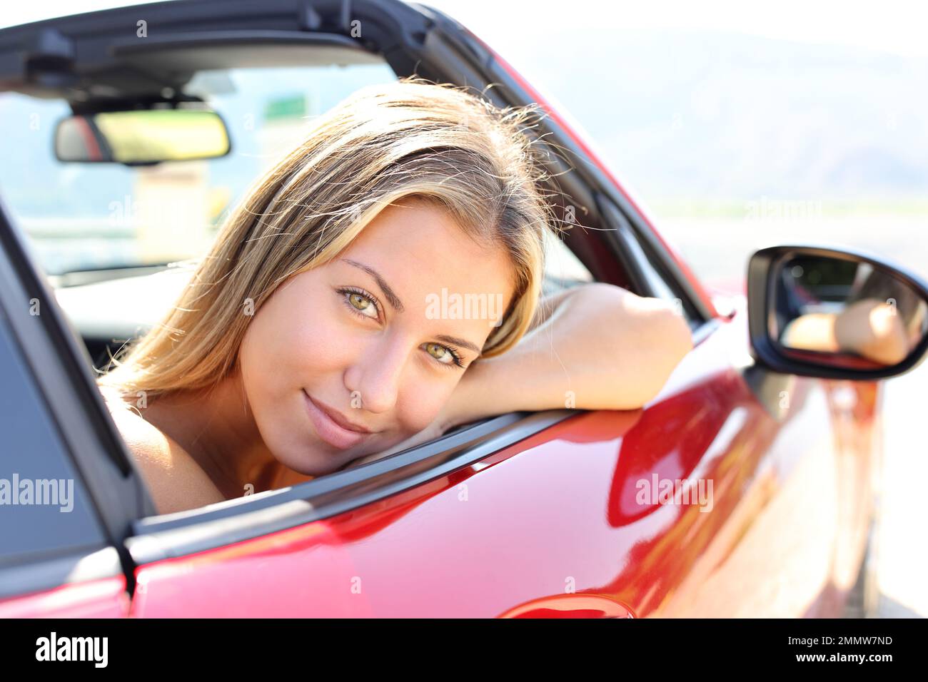 Girl laughing in convertible car hi-res stock photography and images ...