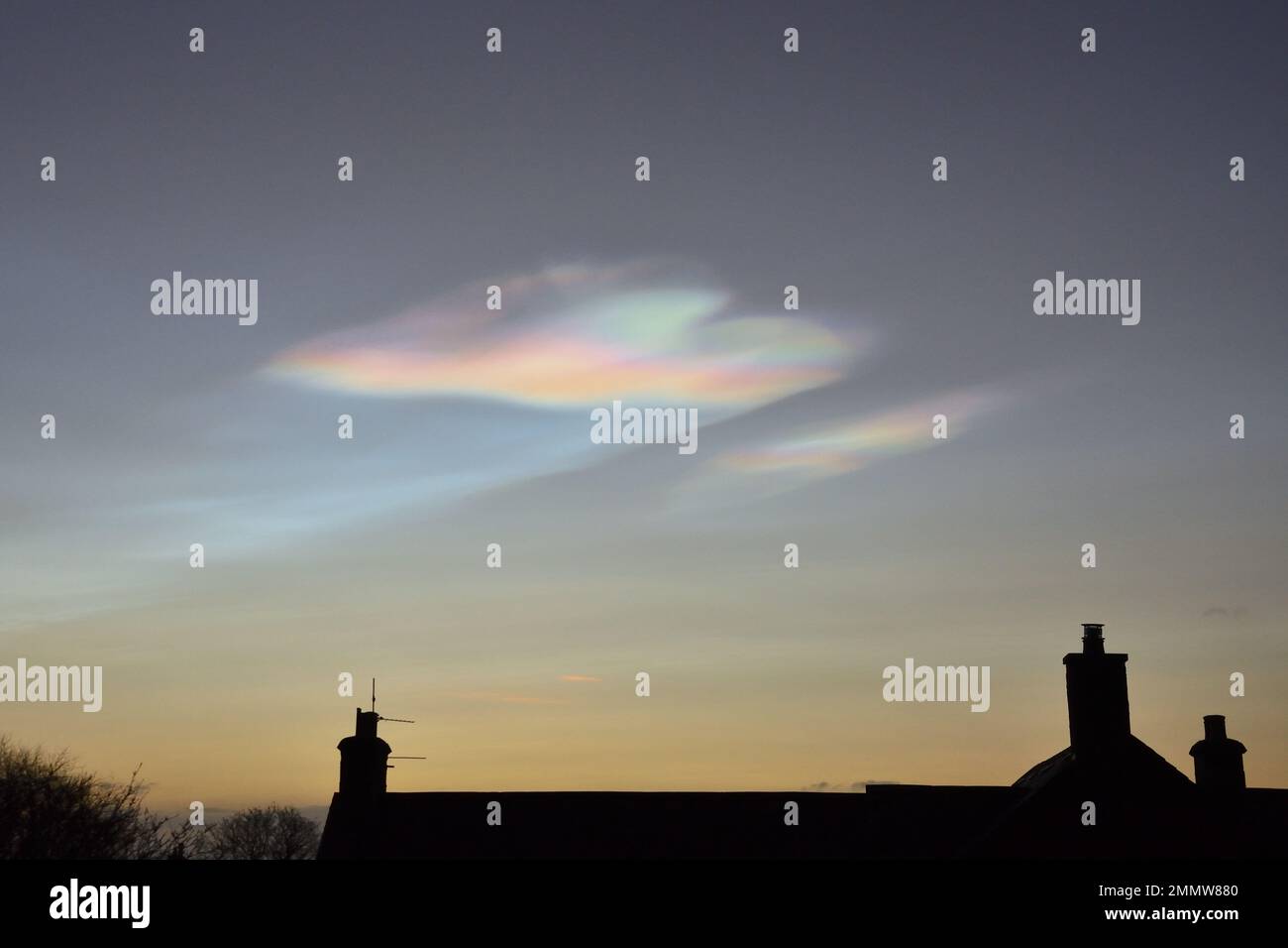 Multi-coloured nacreous clouds at dawn in Golspie, Scottish Highlands ...