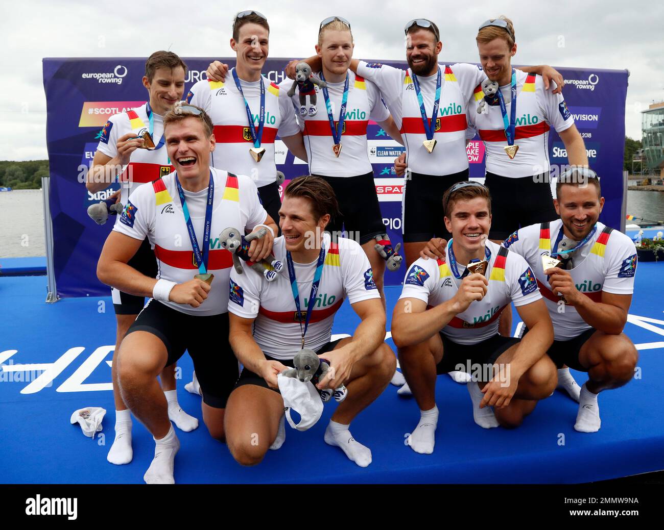 The rowers of the German boat pose with their medals after winning the ...