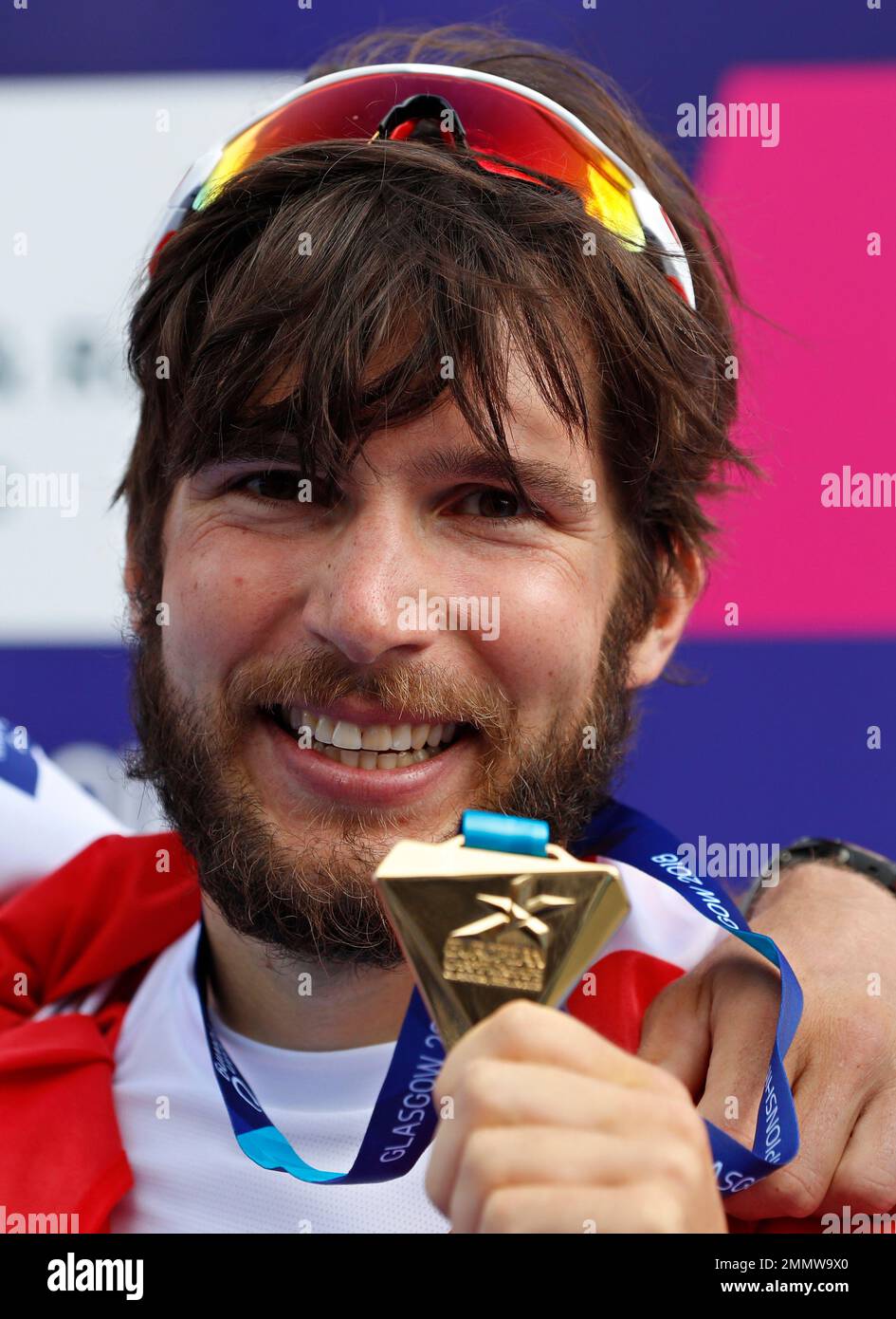 Michael Schmid of Switzerland poses with his medal after winning the ...
