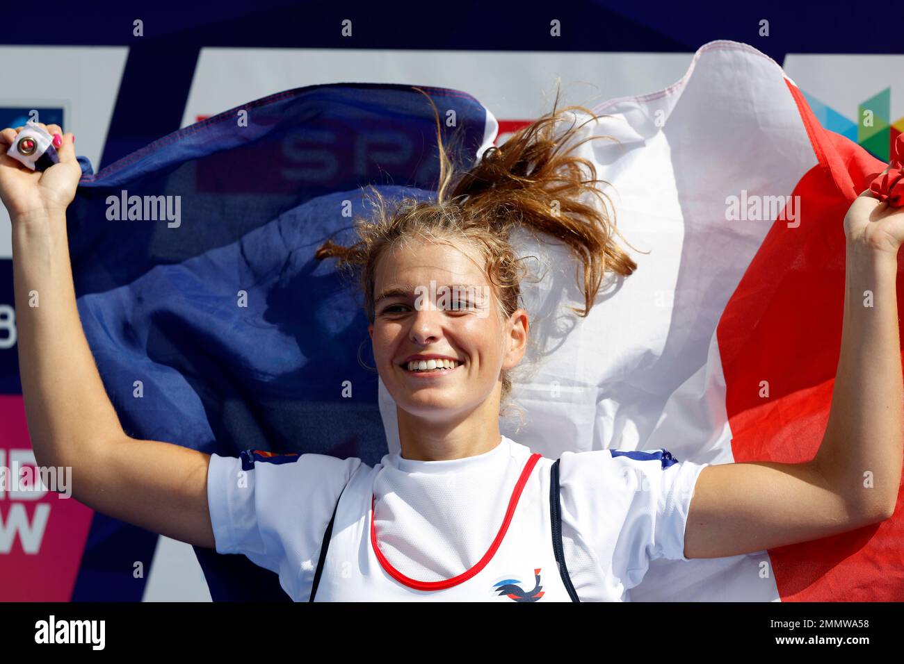 Laura Tarantola of France celebrates on the podium after finishing ...