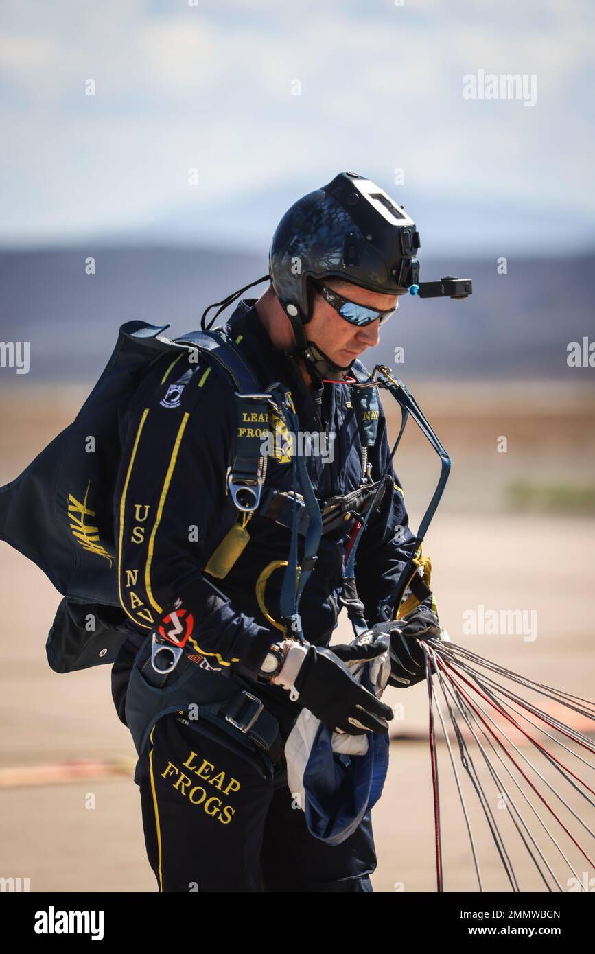 The U.S. Navy Parachute Team, nicknamed the Leap Frogs, conducts an aerial demonstration from a ...
