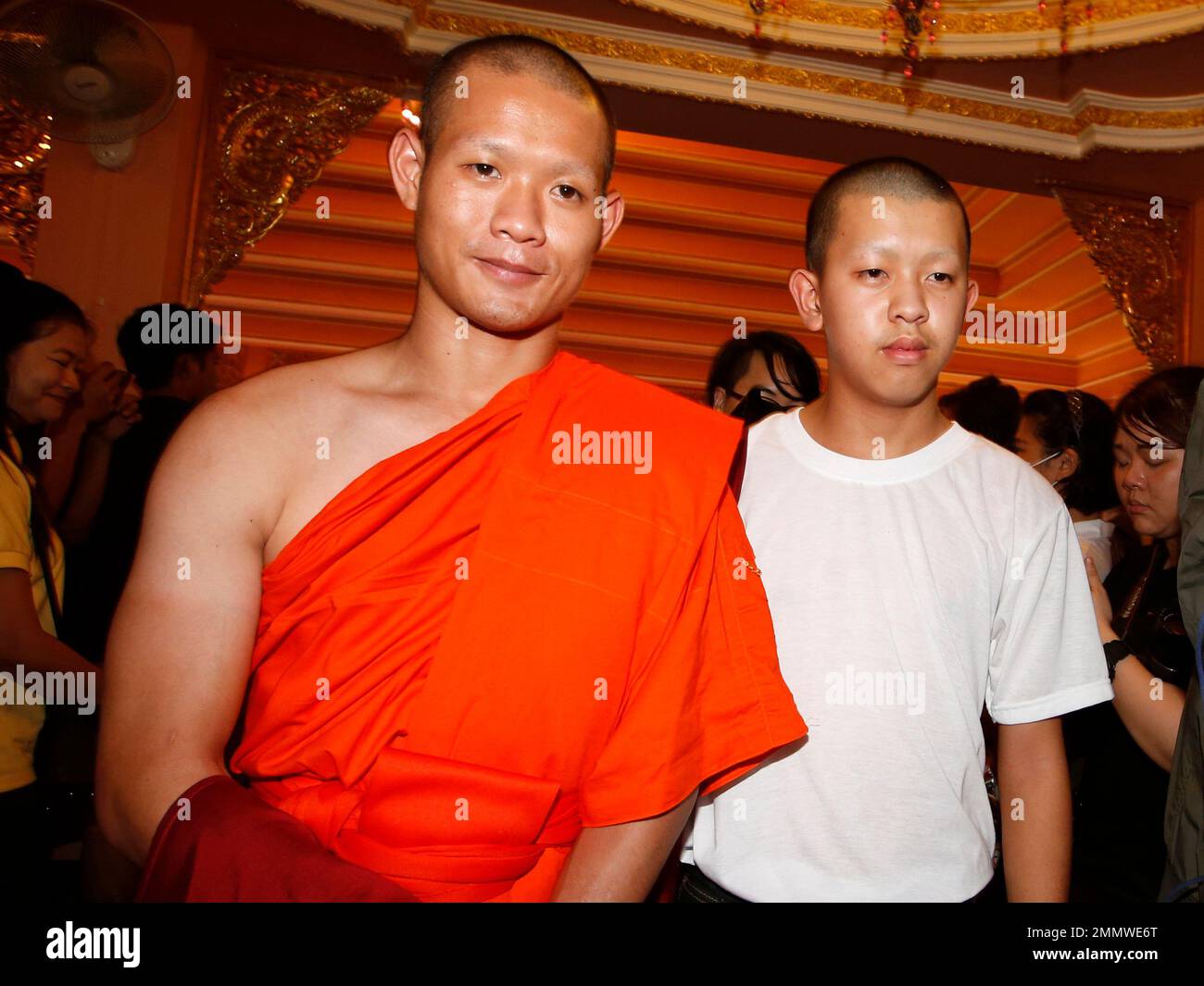 Pornchai Kamluang, right, a member of Wild Boars soccer team, walks ...