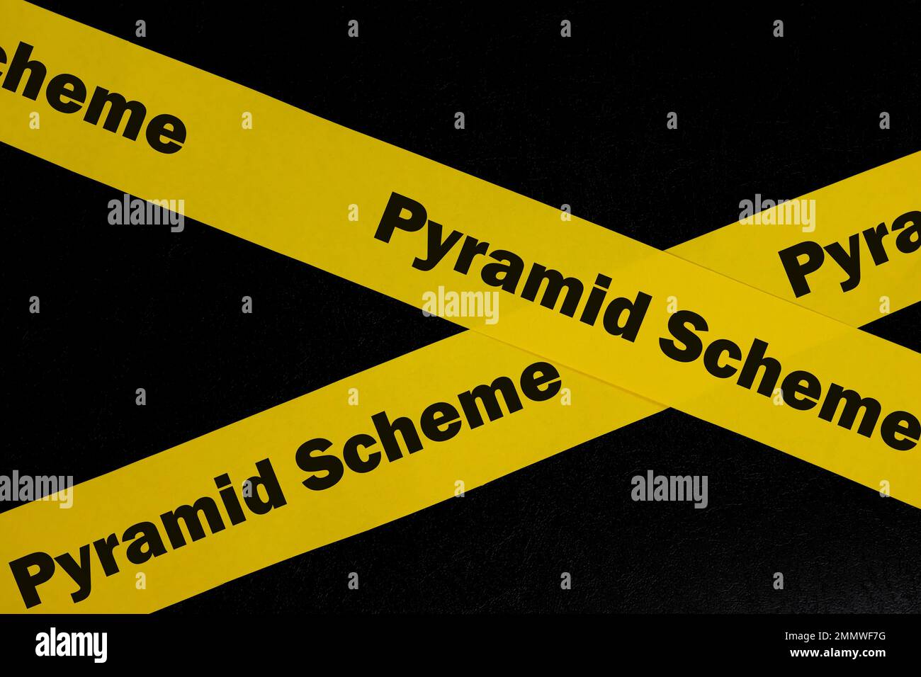 Pyramid scheme alert, caution and warning concept. Yellow barricade ...
